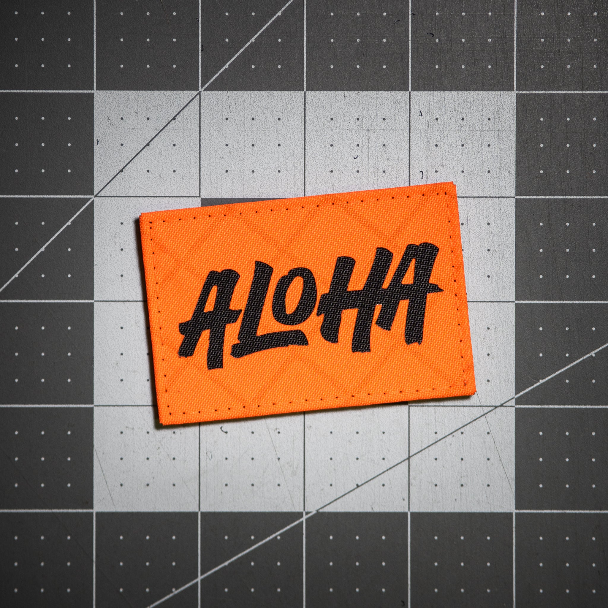 Aloha Patch - Orange EcoPak with Black Letters – Max Pax